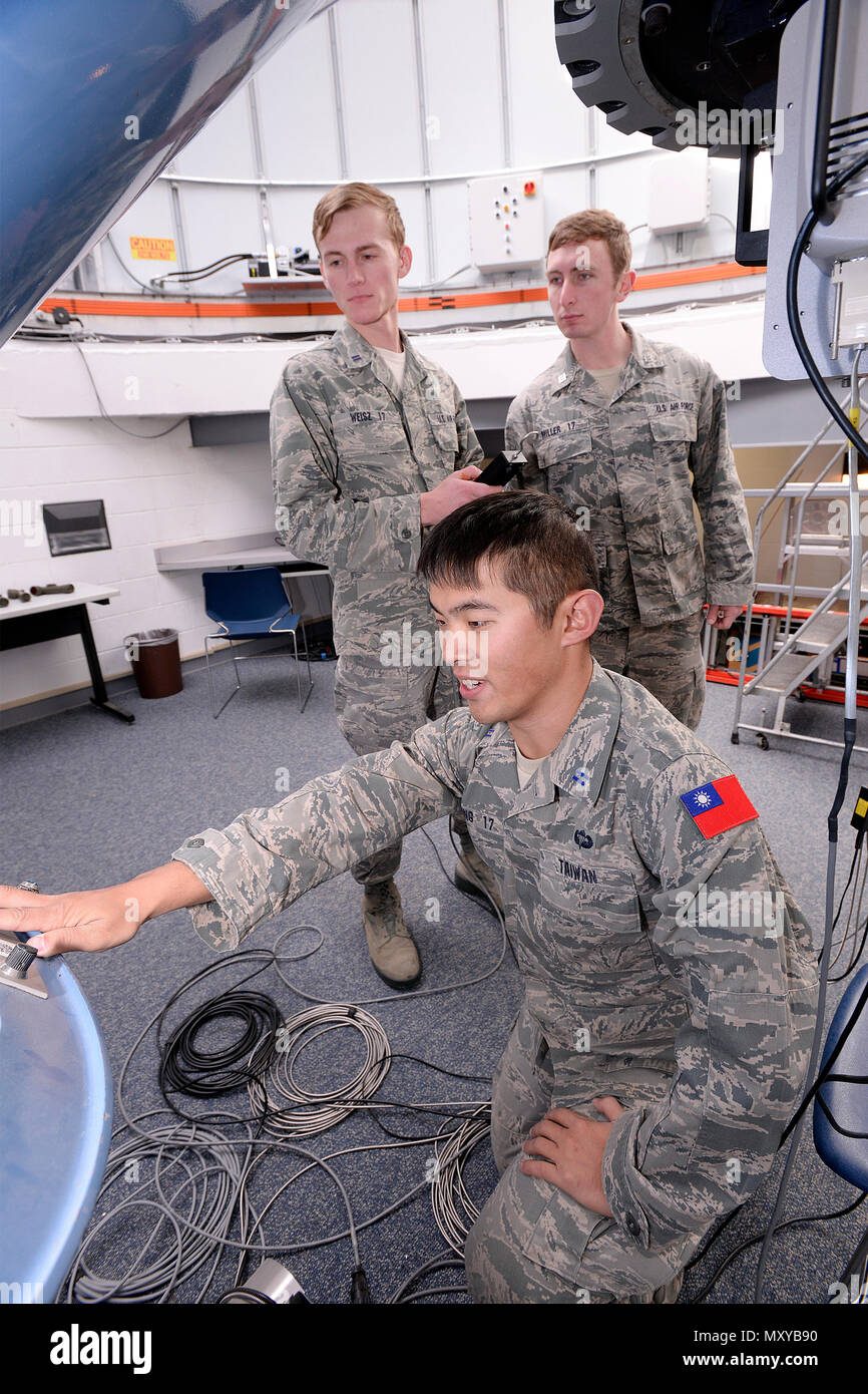 Seniors Daniel Weisz, Matthew Miller and Kuo-Liang Cheng inspect a 24 ...