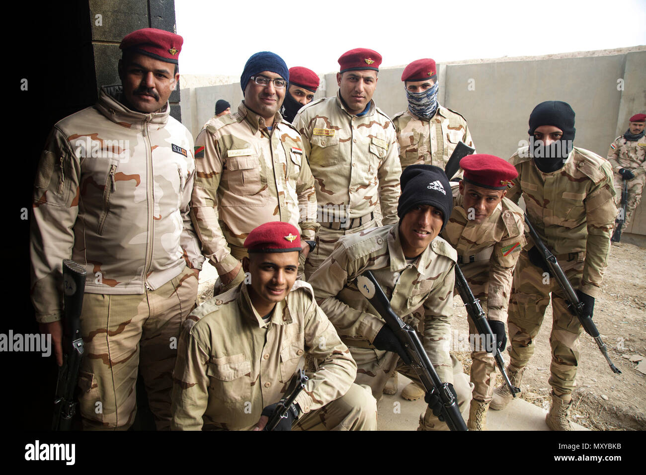 Iraqi soldiers from the Iraqi Army 60th Brigade take a break and ...