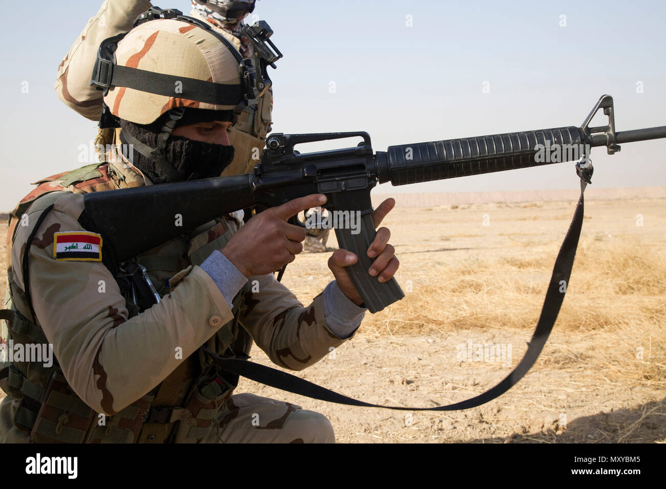 An Iraqi soldier attending the Iraqi Noncommissioned Officer Academy ...