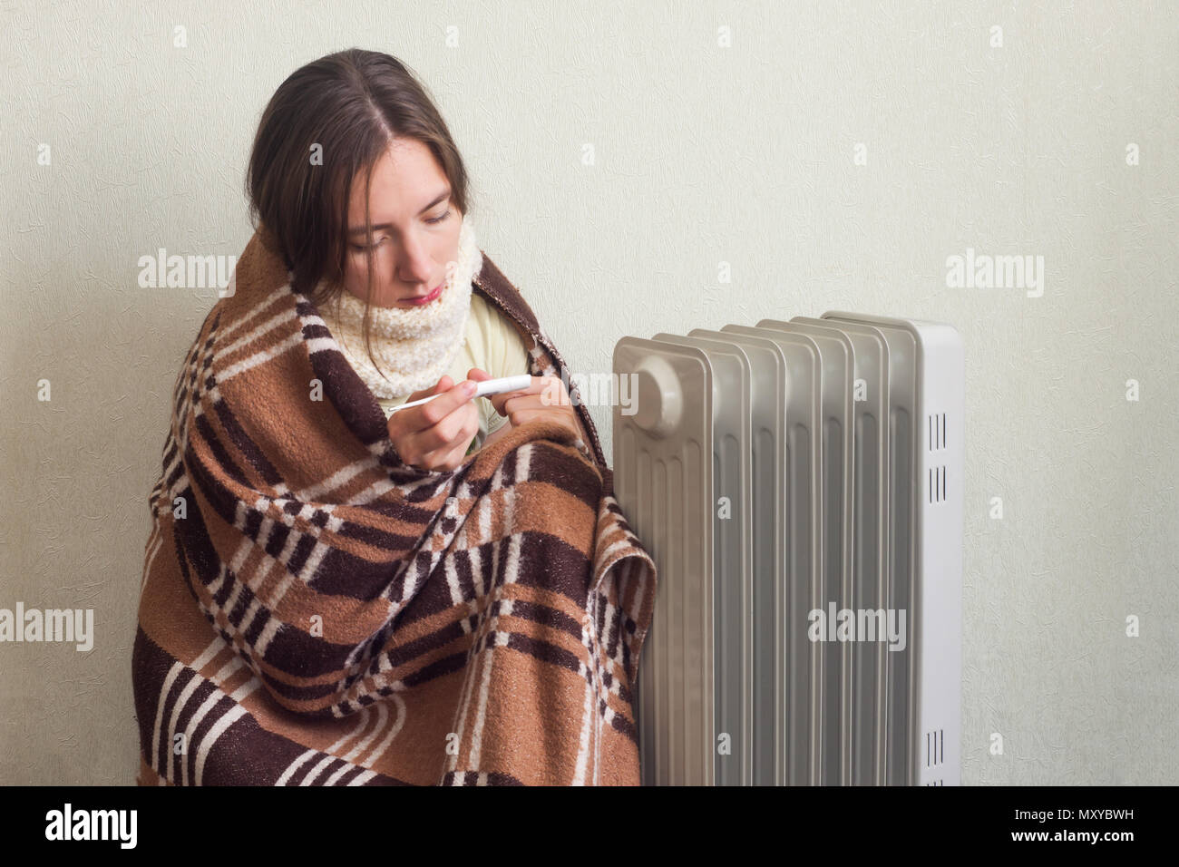 Sick woman measuring temperature hi-res stock photography and images ...