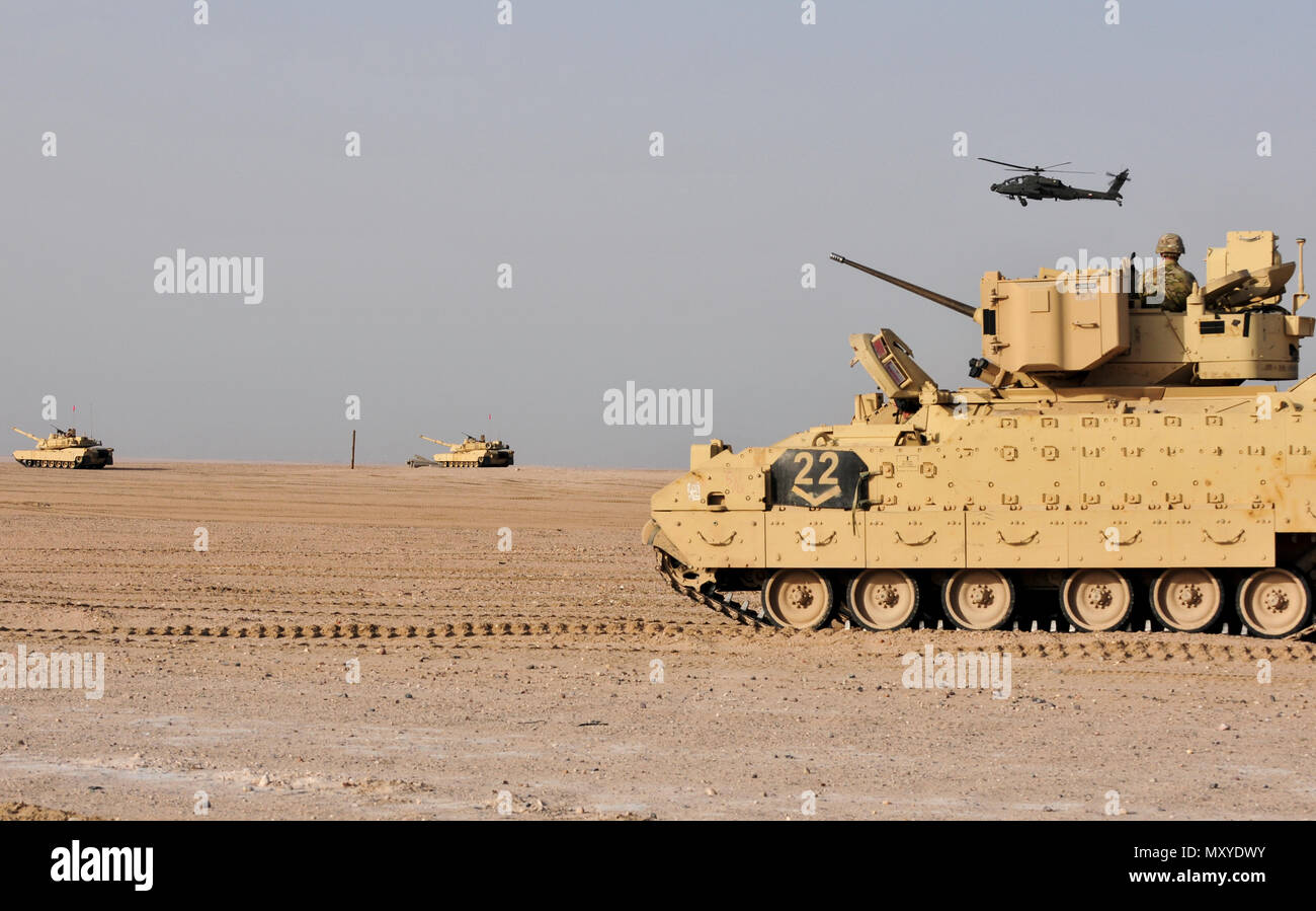 U.S. Army and Kuwaiti Land and Air forces move to engage targets during ...