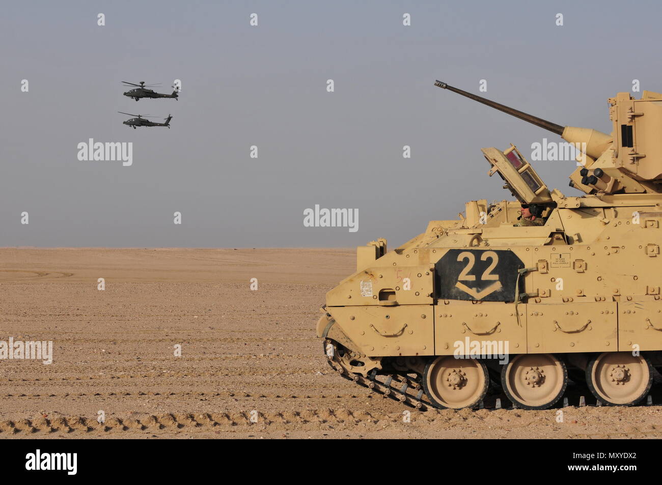 U.S. Army and Kuwaiti Land and Air forces move to engage targets during ...