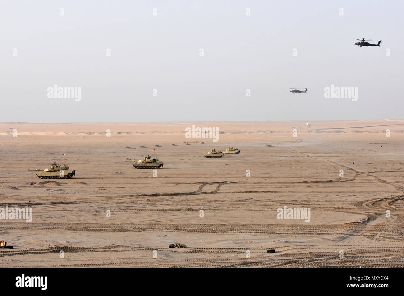 M1A2 Abrams Main Battle Tanks move to engage targets during a joint ...
