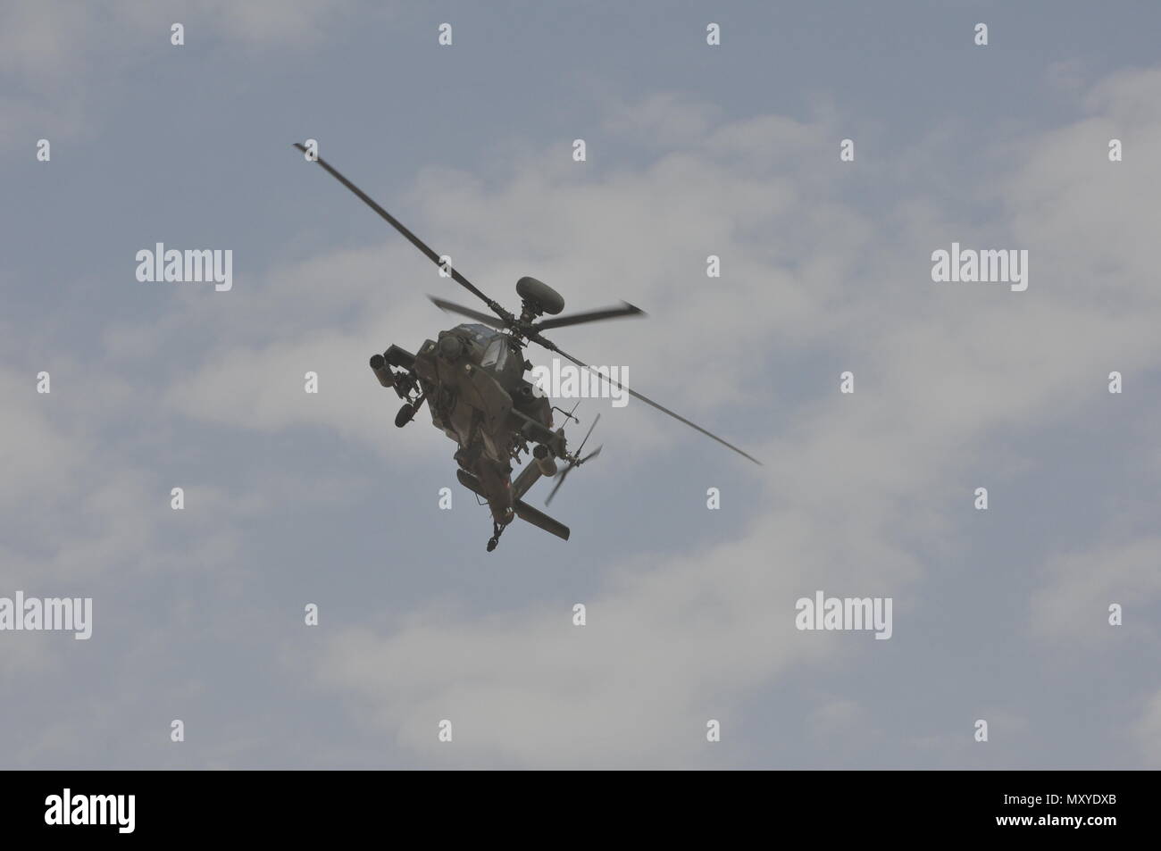 AH-64 Apache Helicopters prepare to engage a target during a joint ...