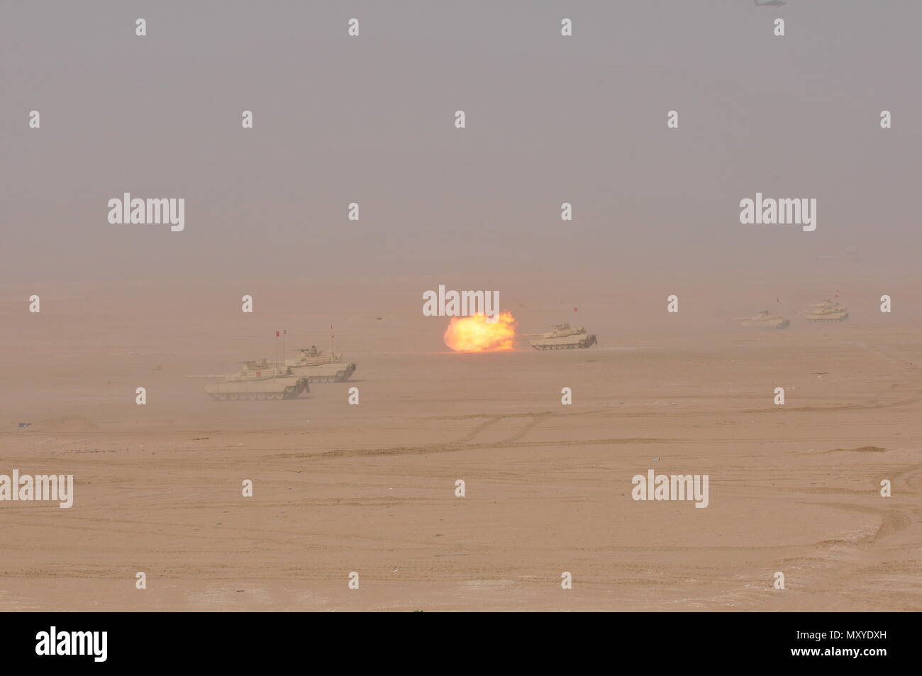 M1A2 Abrams Main Battle Tanks move to engage targets during a joint ...