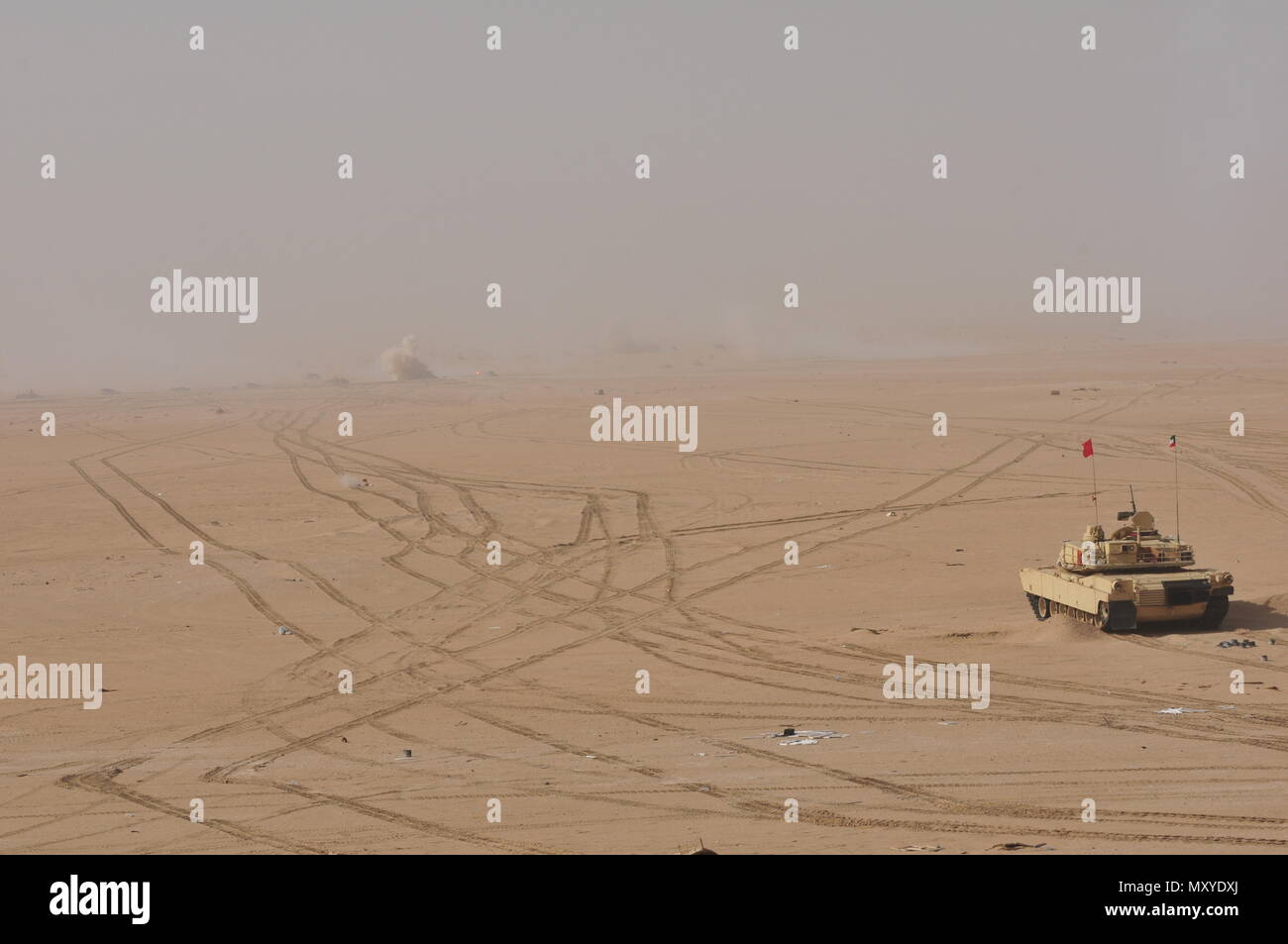 M1A2 Abrams Main Battle Tanks move to engage targets during a joint ...