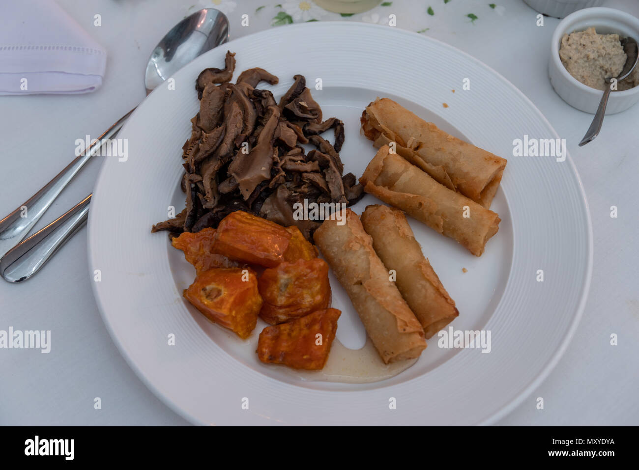 Organic desert on the white plate, Philippines Stock Photo - Alamy