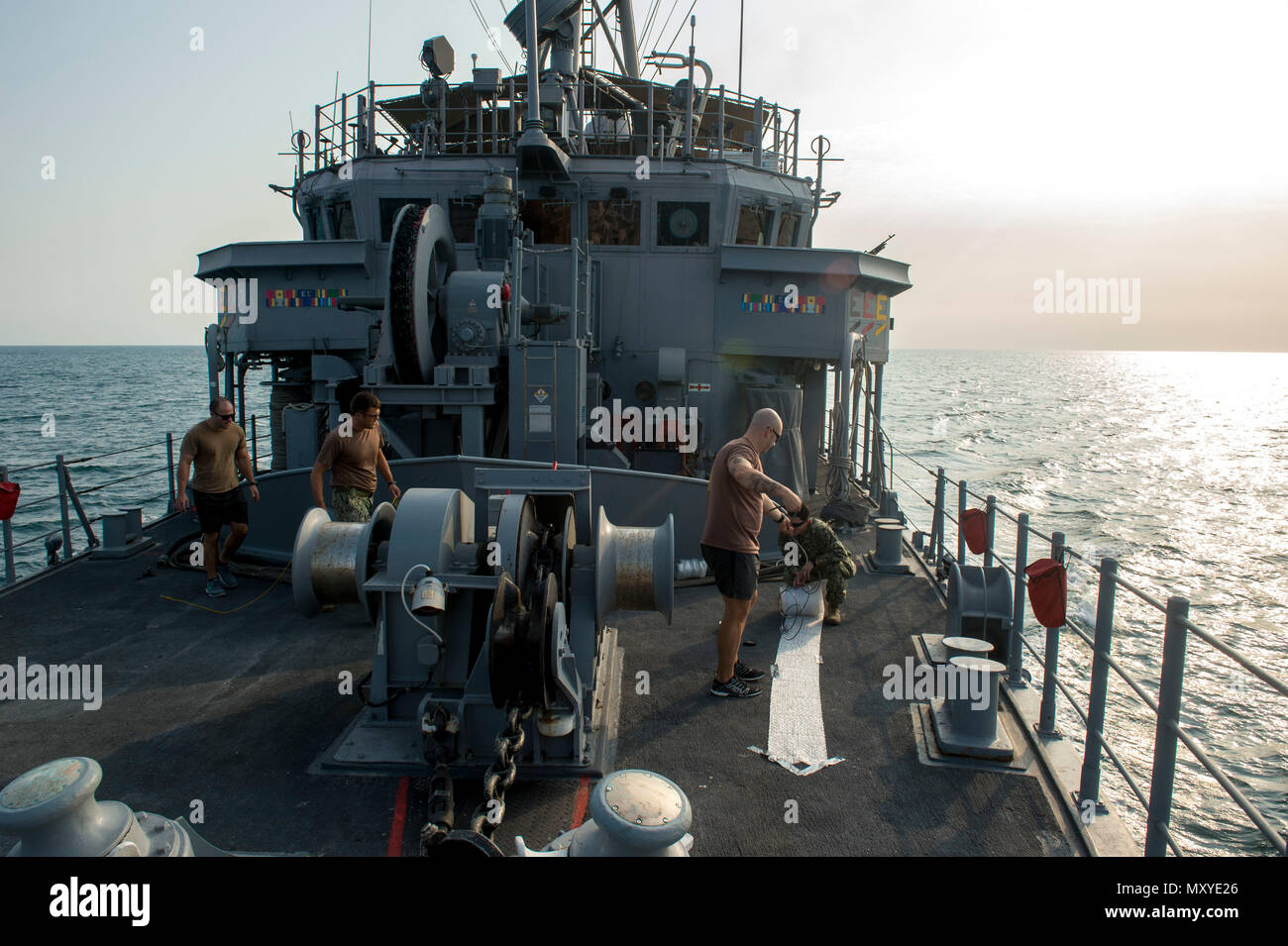 Sailors aboard USS Devastator (MCM 6) in the Arabian Gulf assemble a ...