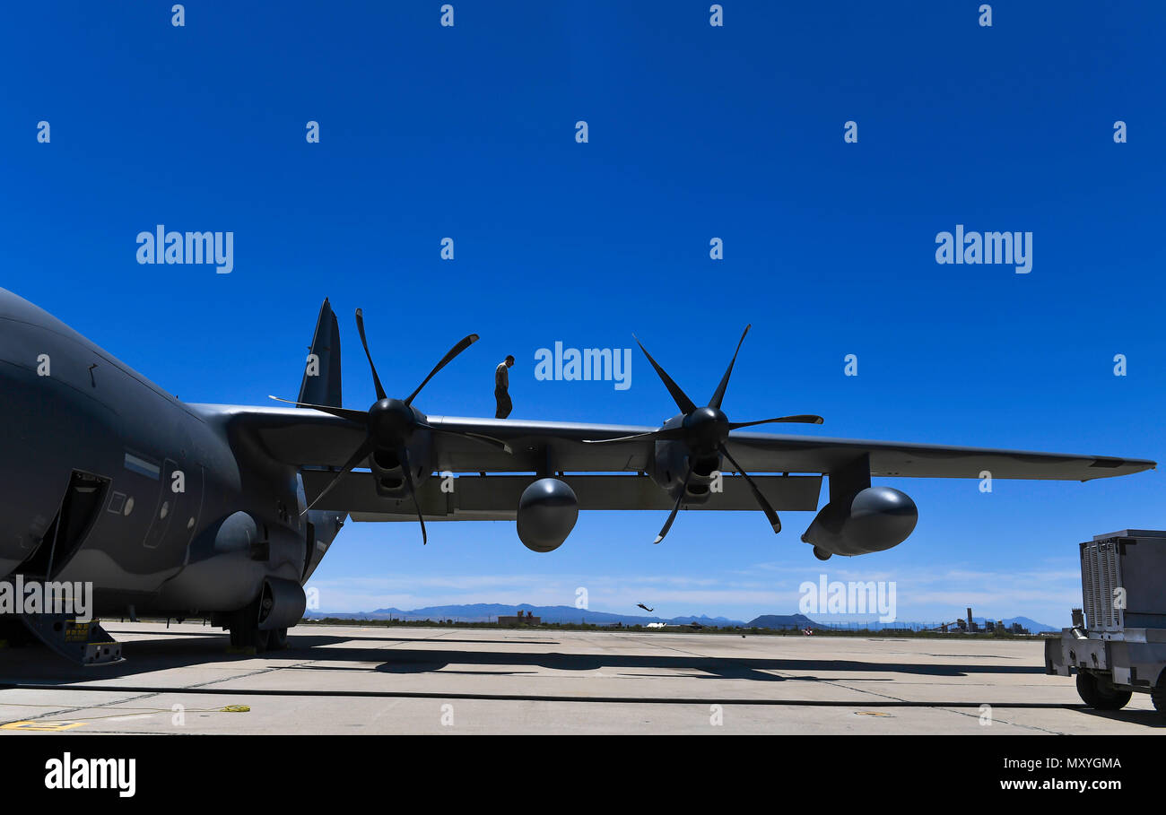 A loadmaster, assigned to the 79th Rescue Squadron, preforms pre-flight ...