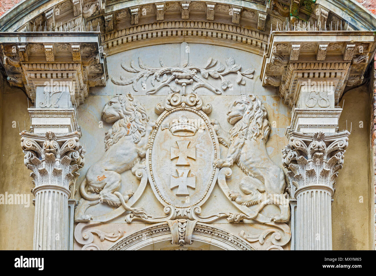 Ornate entrance to the Town Hall in the Old Town of Gdansk in Poland ...