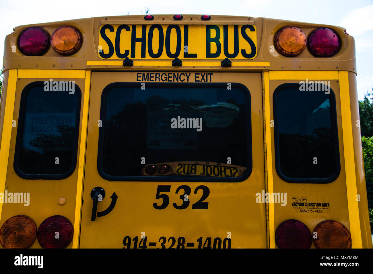 School buses parked on weekend Stock Photo - Alamy