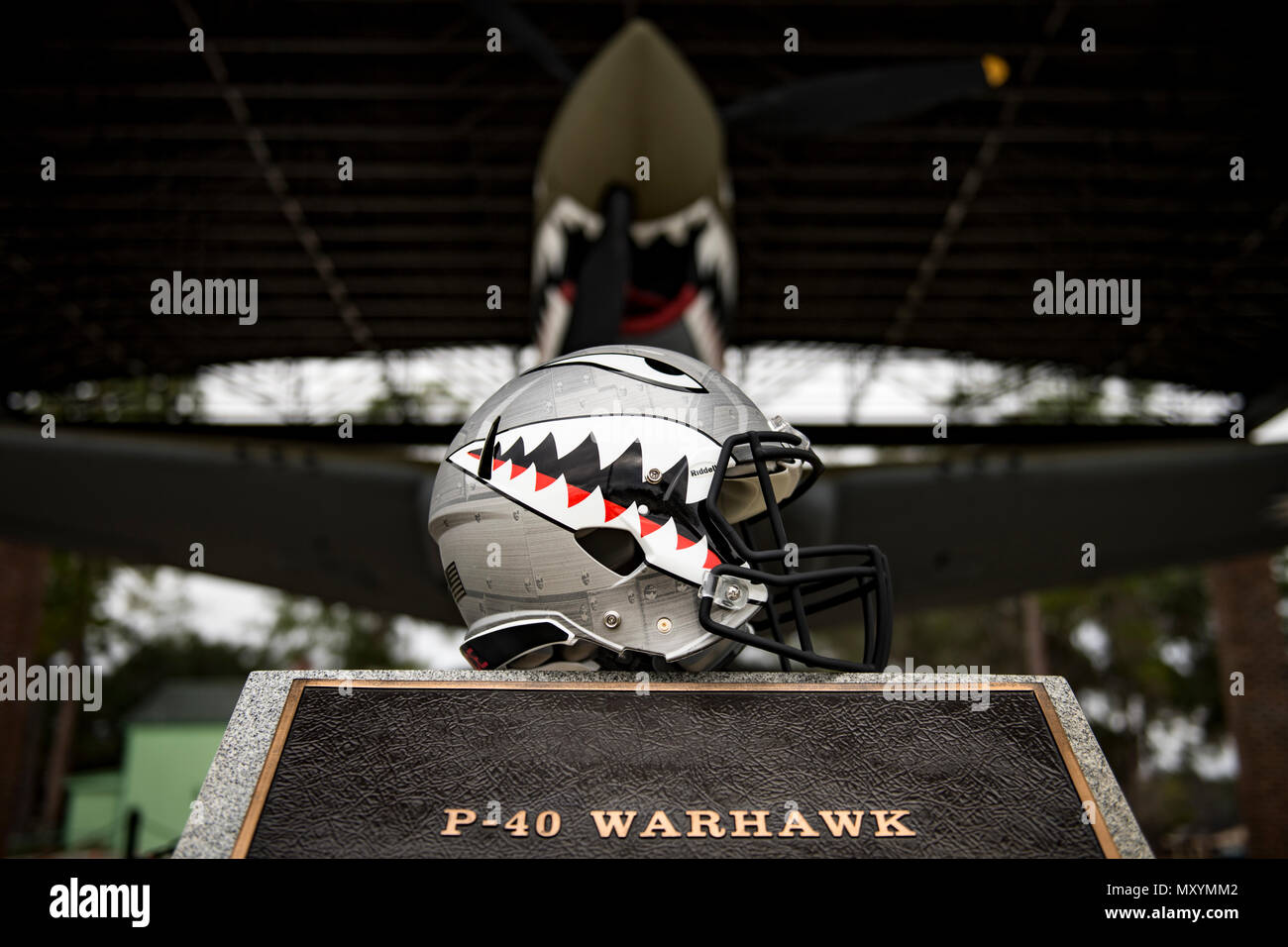 A U.S. Air Force Academy football helmet is on display in front of a P ...