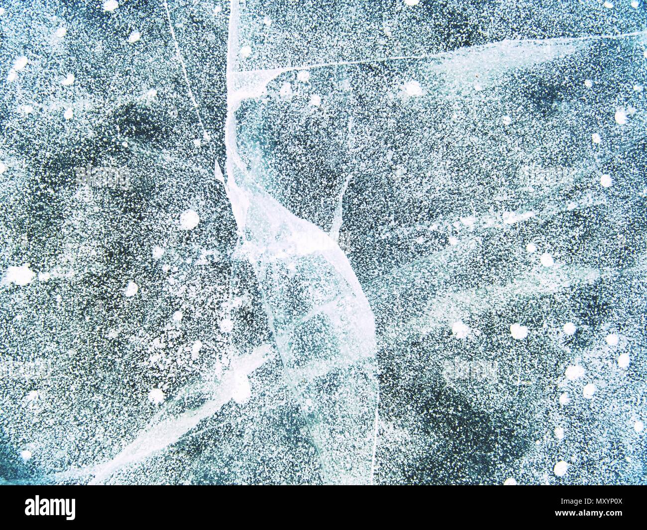 Frozen air in arctic ice. Colorful piece of ice with sun rays ...