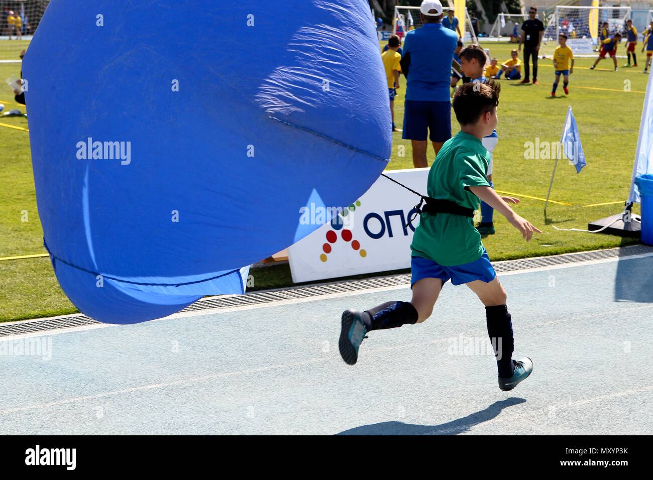 boy and parachute at the ground Stock Photo - Alamy