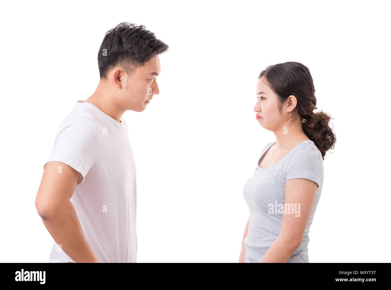 Portrait of angry couple looking at each other during conflict Stock ...