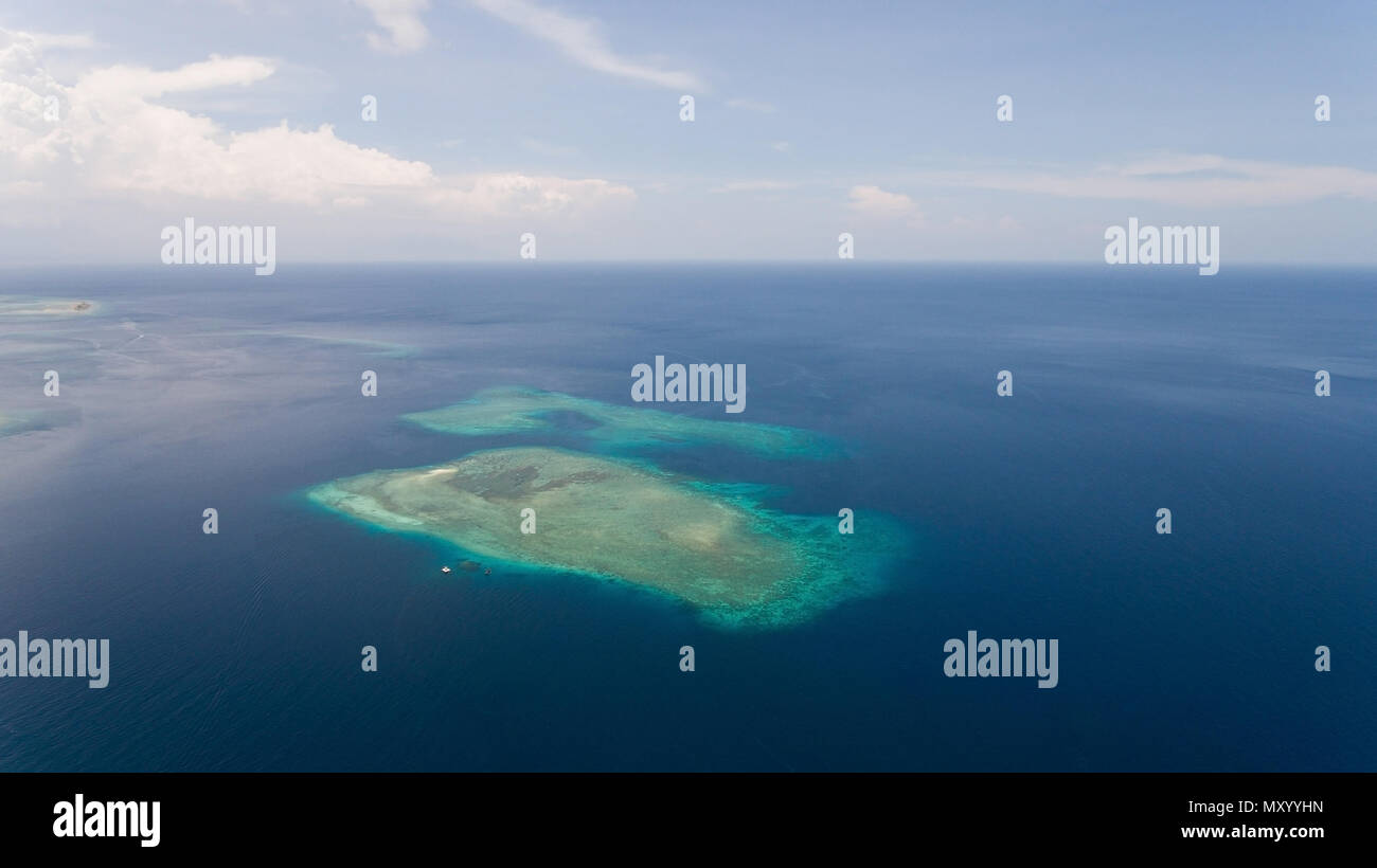 Aerial view coral reef, atoll with turquoise water in the sea.Tropical ...
