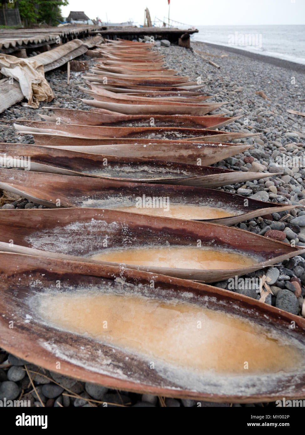 Production of sea salt in the Bali,Indonesia. Salt crystallizes out of ...