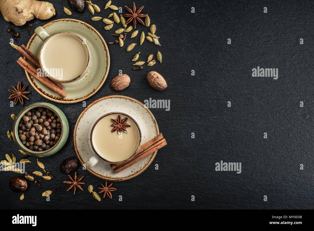 Traditional indian drink - masala chai tea (milk tea) with spices on ...