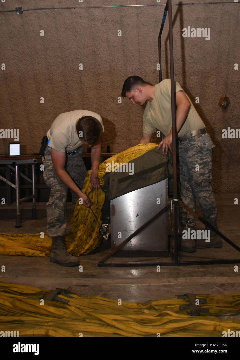 U.S. Air Force Airman 1st Class Eric Hornbeck, left, and Senior Airman ...