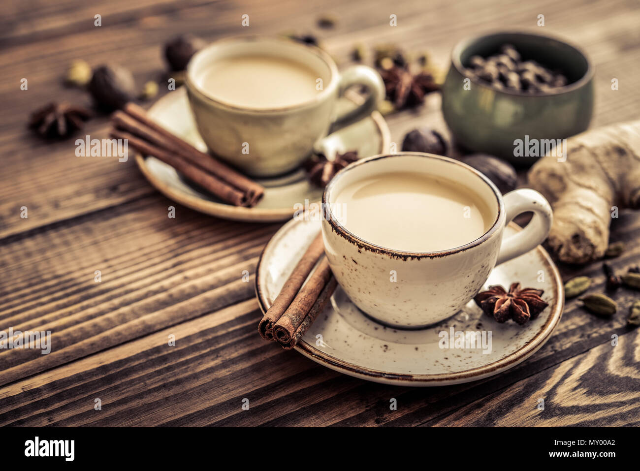 Traditional indian drink - masala chai tea (milk tea) with spices on ...