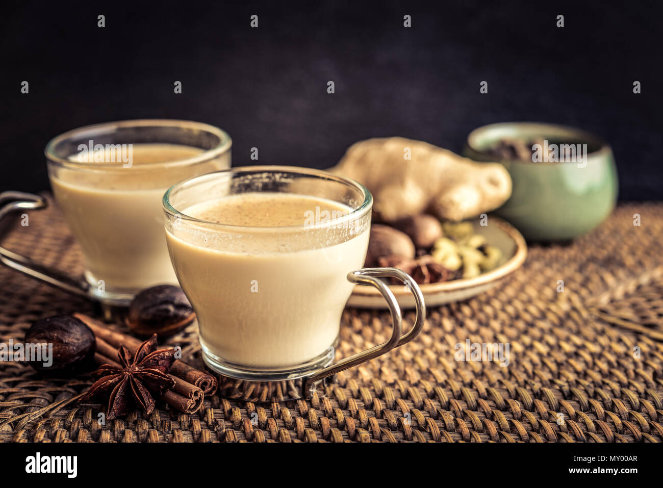 Traditional indian drink - masala chai tea (milk tea) with spices on ...