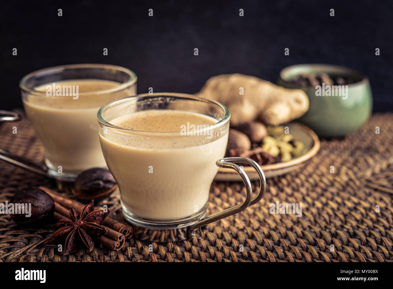 Traditional indian drink - masala chai tea (milk tea) with spices on ...