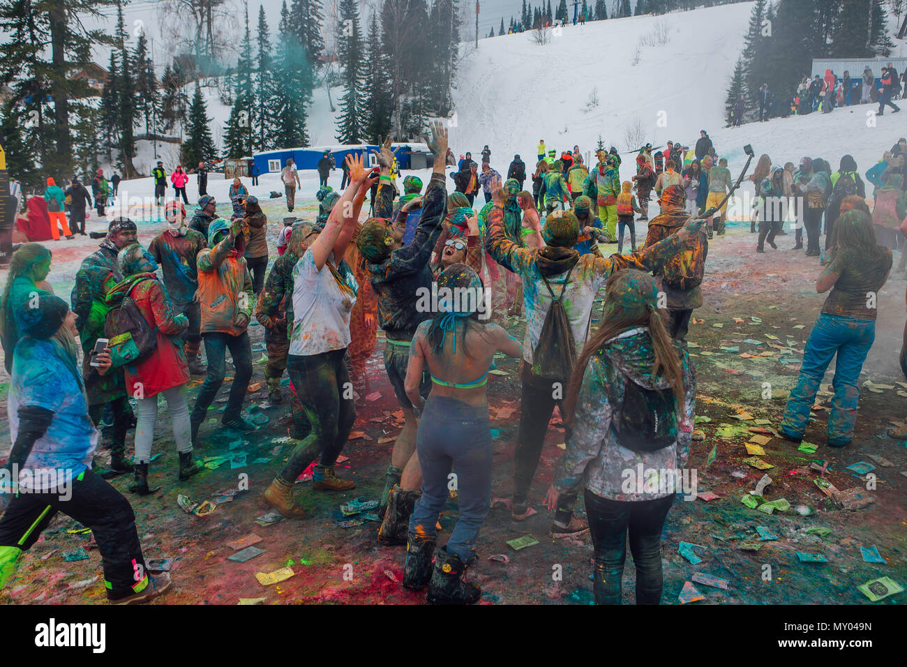 A group of a young people throwing colorful holi powder Stock Photo - Alamy