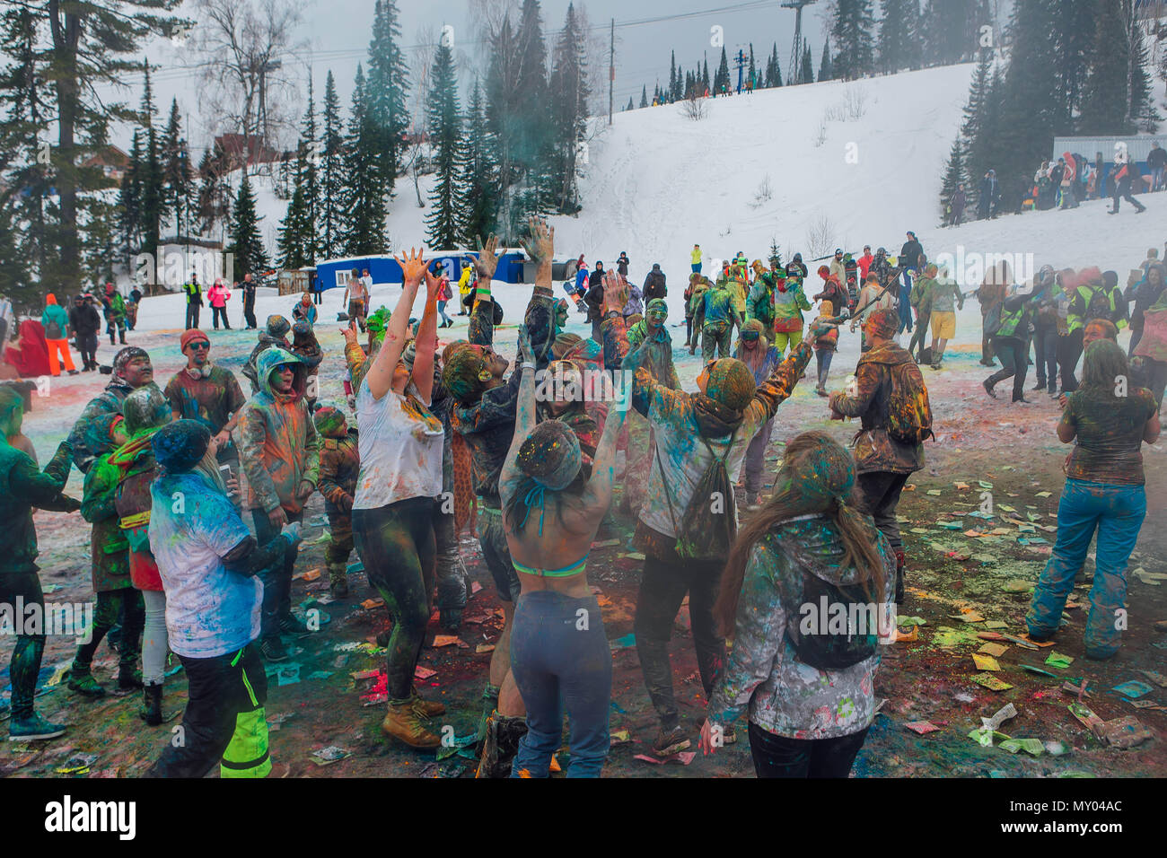 A group of a young people throwing colorful holi powder Stock Photo - Alamy