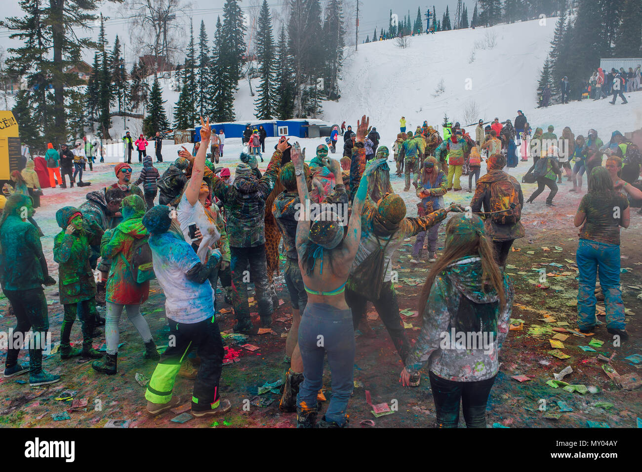 A group of a young people throwing colorful holi powder Stock Photo - Alamy