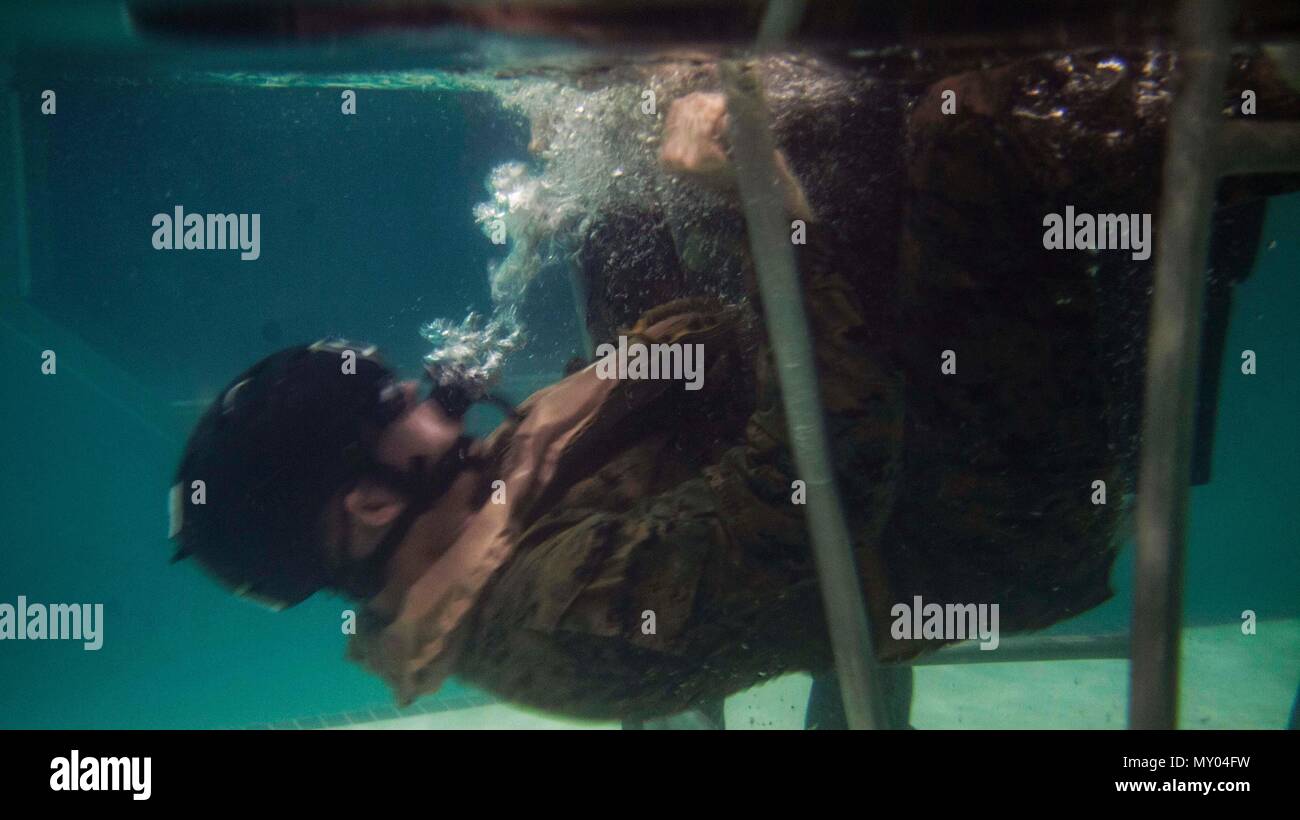 Under water helicopter egress training hi-res stock photography and ...