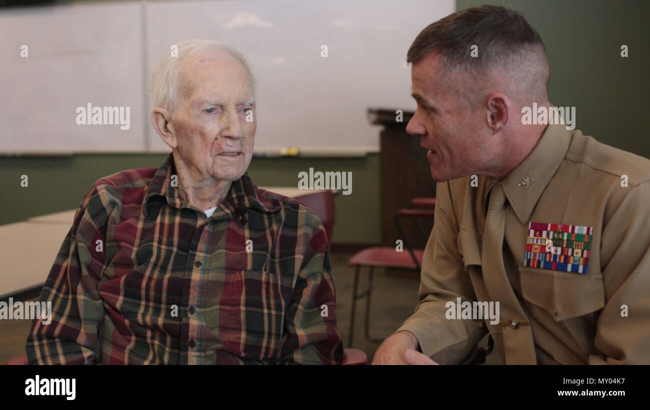 Col. Thomas M. Fahy (right) speaks with retired 1st Lt. John J. O’Leary ...