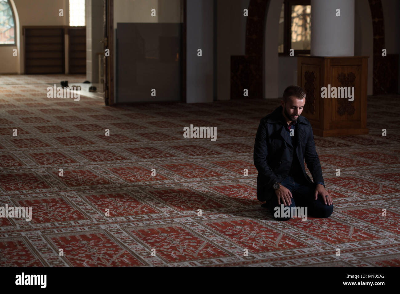 Humble Muslim Man Is Praying In The Mosque Stock Photo - Alamy