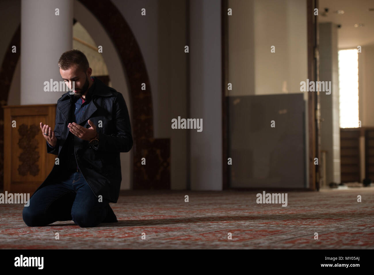 Humble Muslim Man Is Praying In The Mosque Stock Photo - Alamy