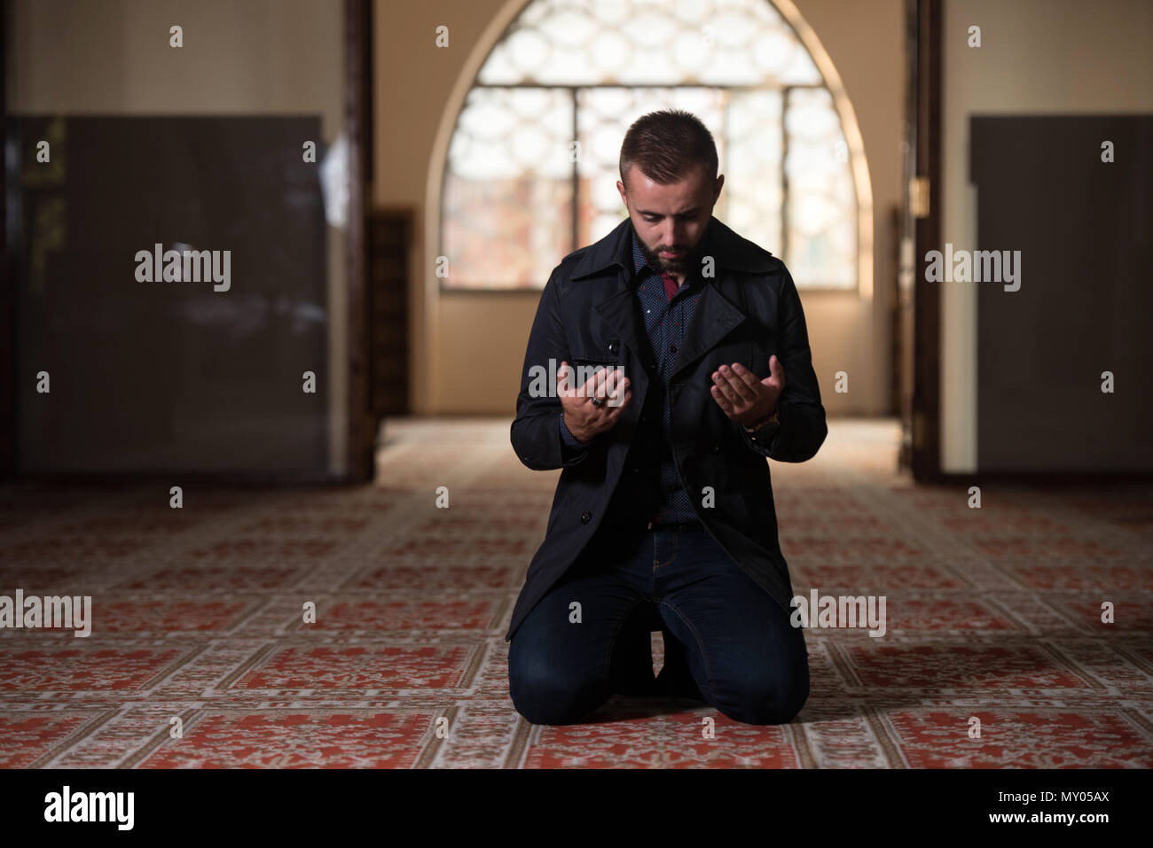 Young Muslim Man Making Traditional Prayer To God Allah Stock Photo - Alamy