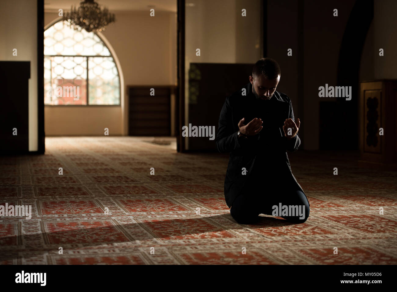 Young Muslim Man Making Traditional Prayer To God Allah Stock Photo - Alamy