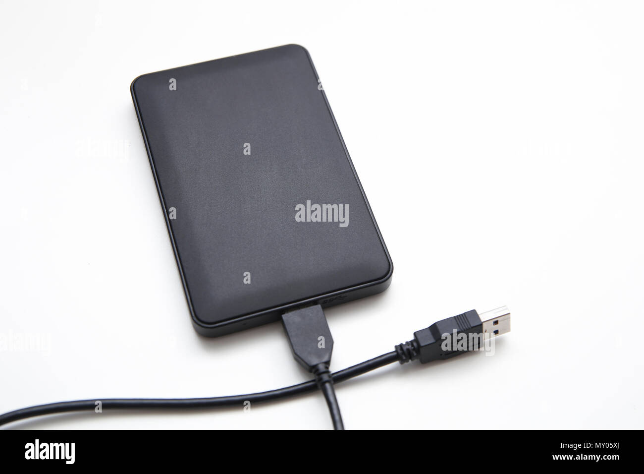 External hard disk in a white background Stock Photo - Alamy