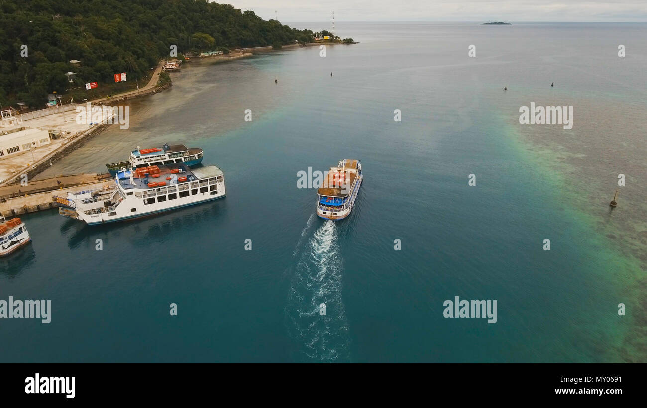 Aerial view passenger ferry floats in the blue sea.Asian passenger boat ...