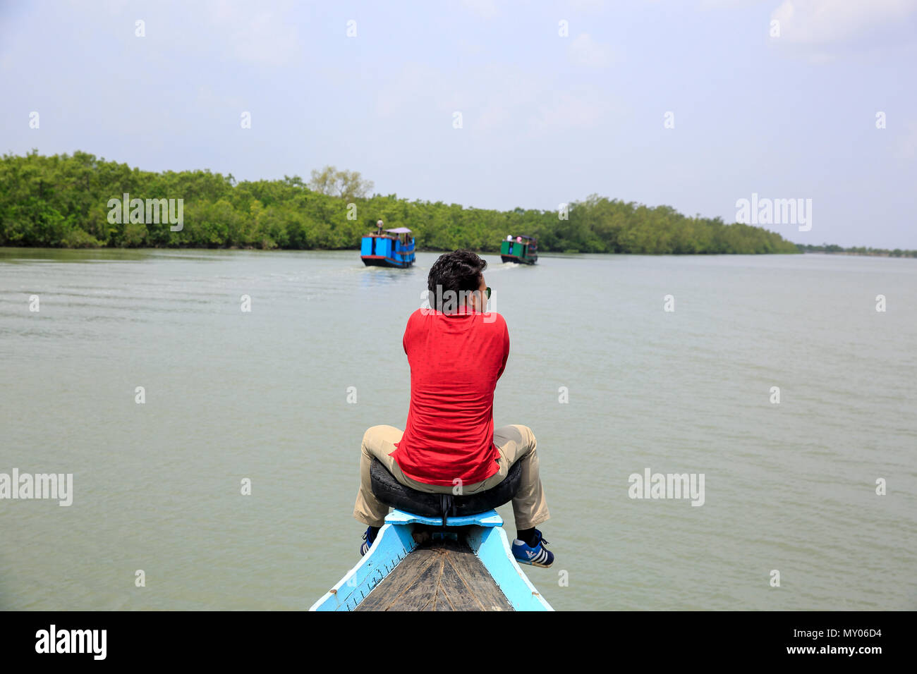 Tourist boat inside the Sundarbans, the largest mangrove forest in the world. Satkhira ...
