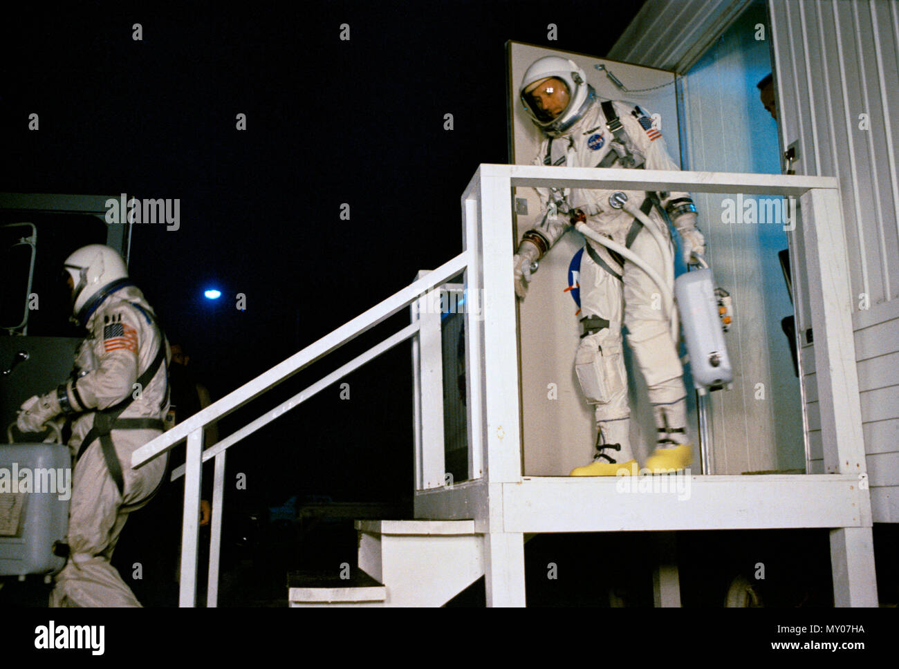 (15 Dec. 1965) --- Astronauts Walter M. Schirra Jr. (leading), command ...