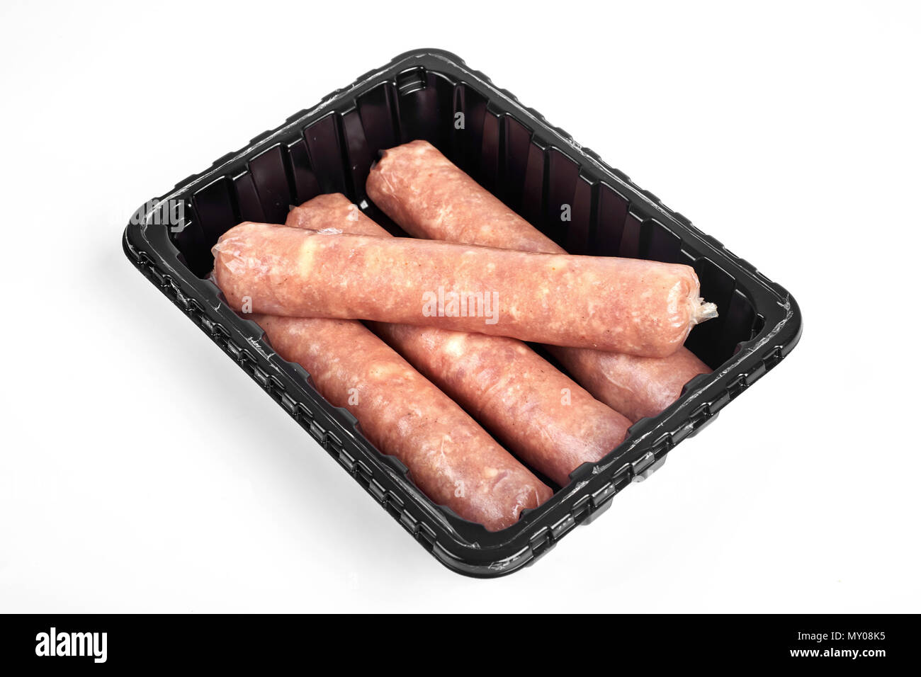 Package of raw sausages isolated on white background Stock Photo - Alamy