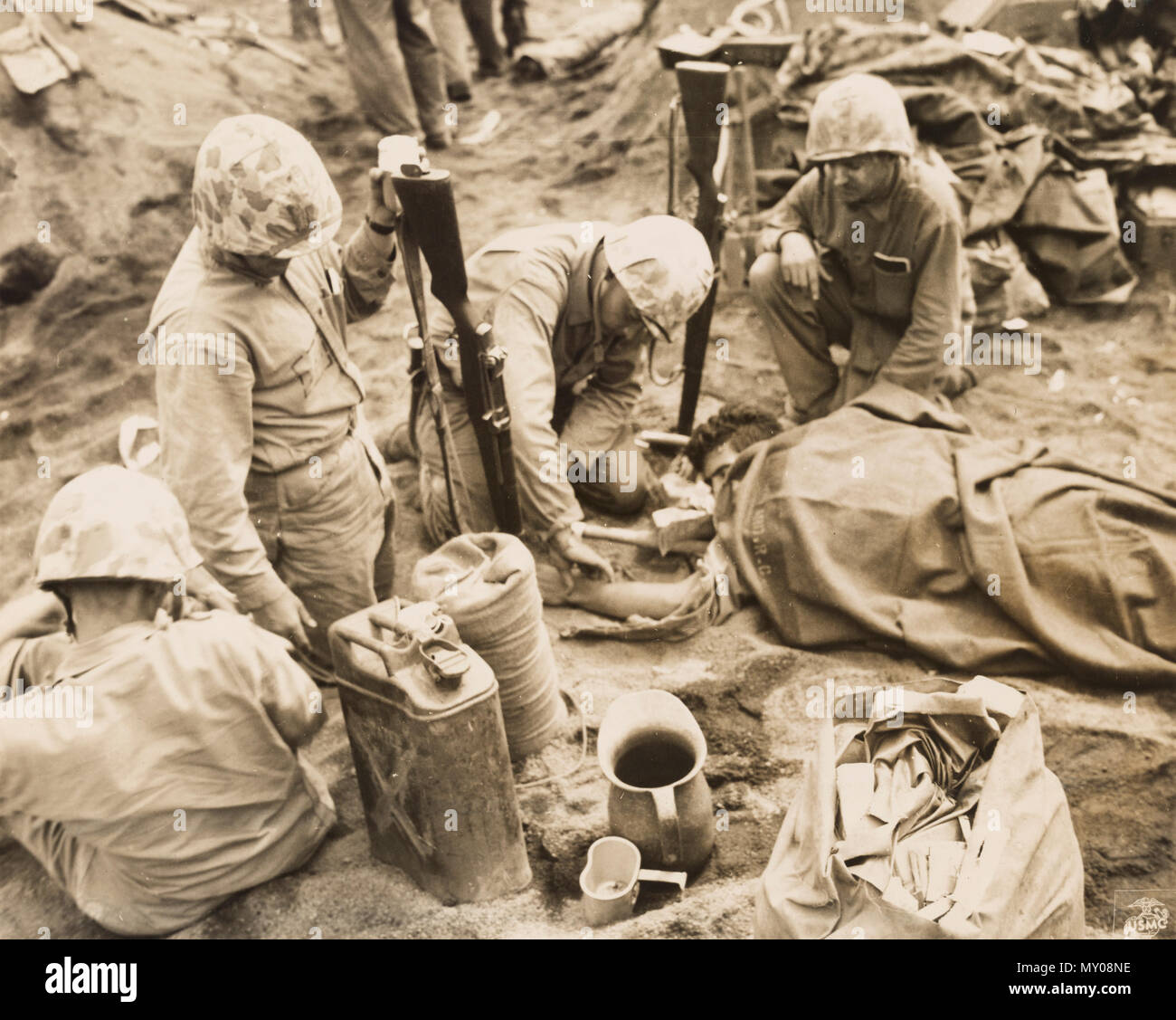 Wounded soldiers on Iwo Jima receive plasma to help recover from shock ...