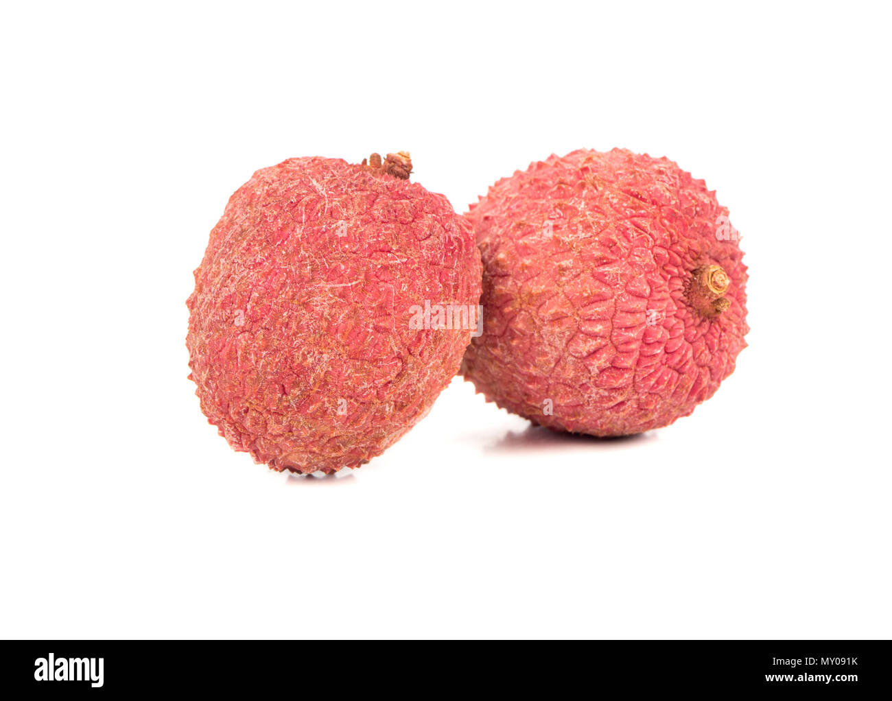 Two chinese lychee fruit in shell isolated on white background Stock ...