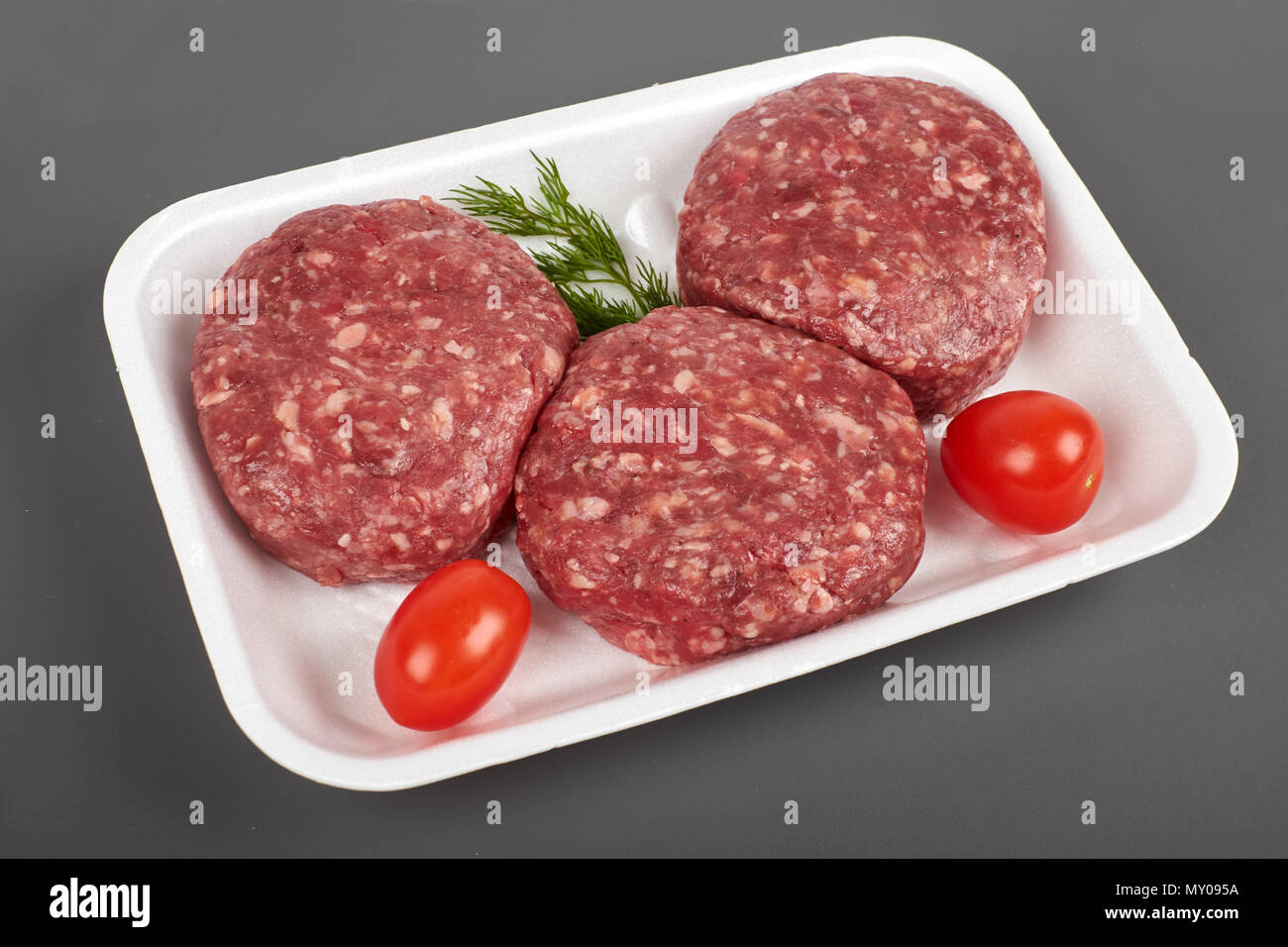 beef burgers in plastic package isolated on white background Stock ...