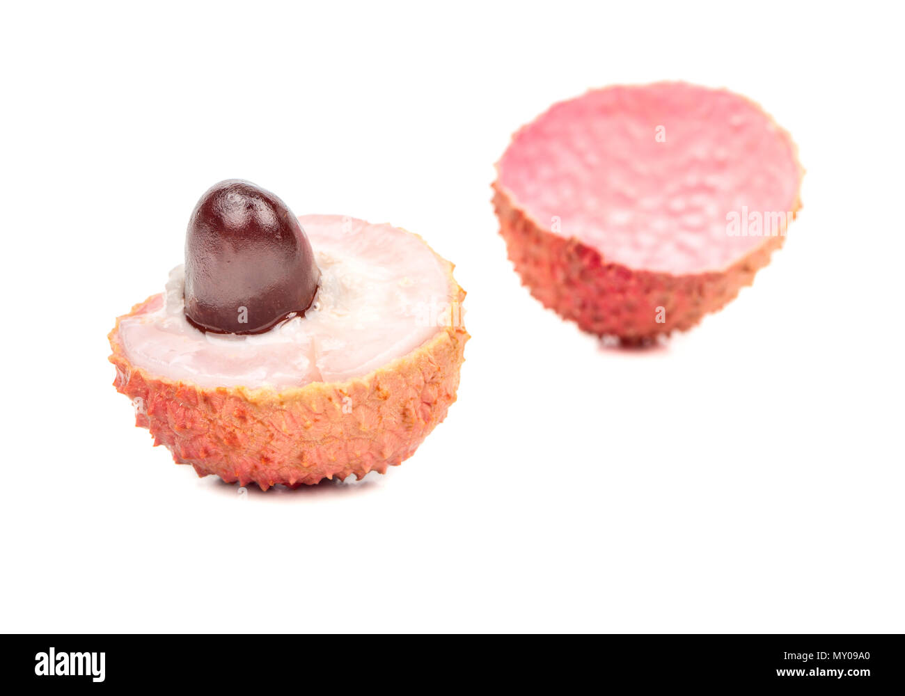 Chinese lychee fruit cut into two halves on white background Stock ...