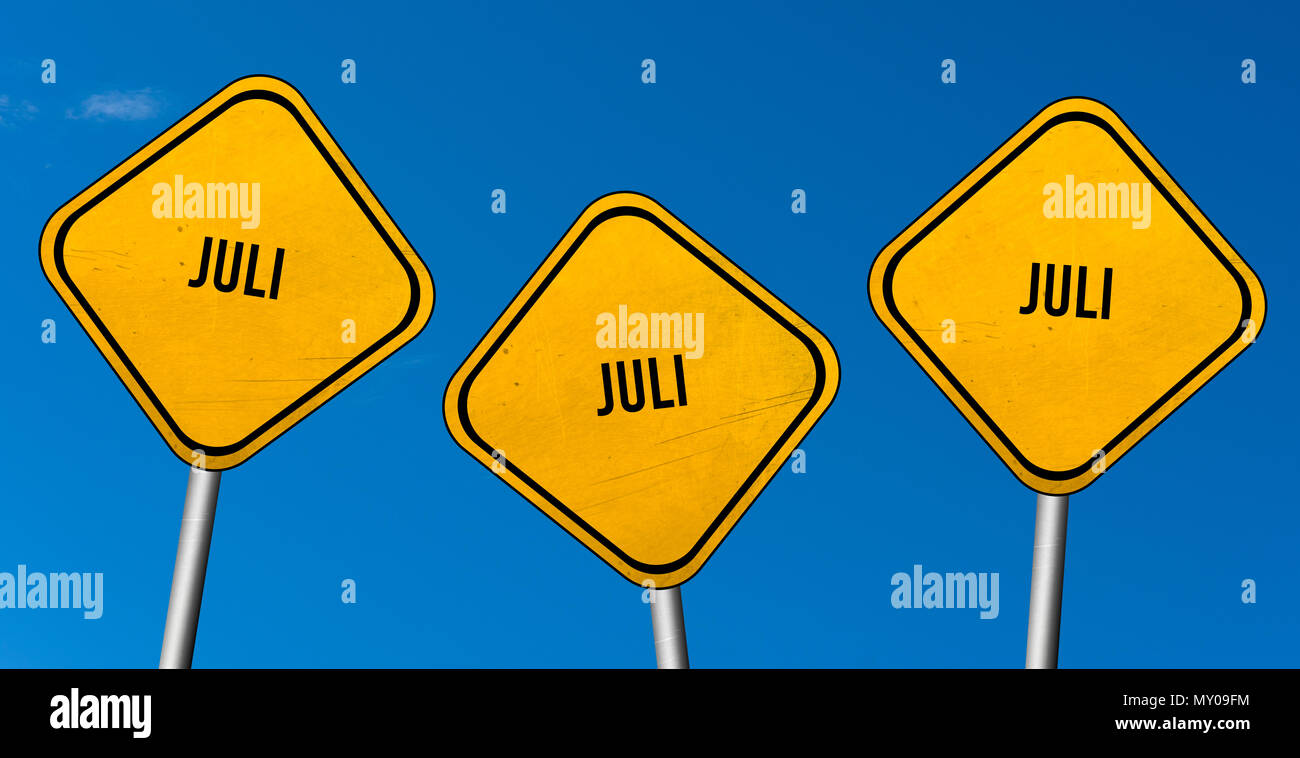 Juli - yellow signs with blue sky Stock Photo - Alamy