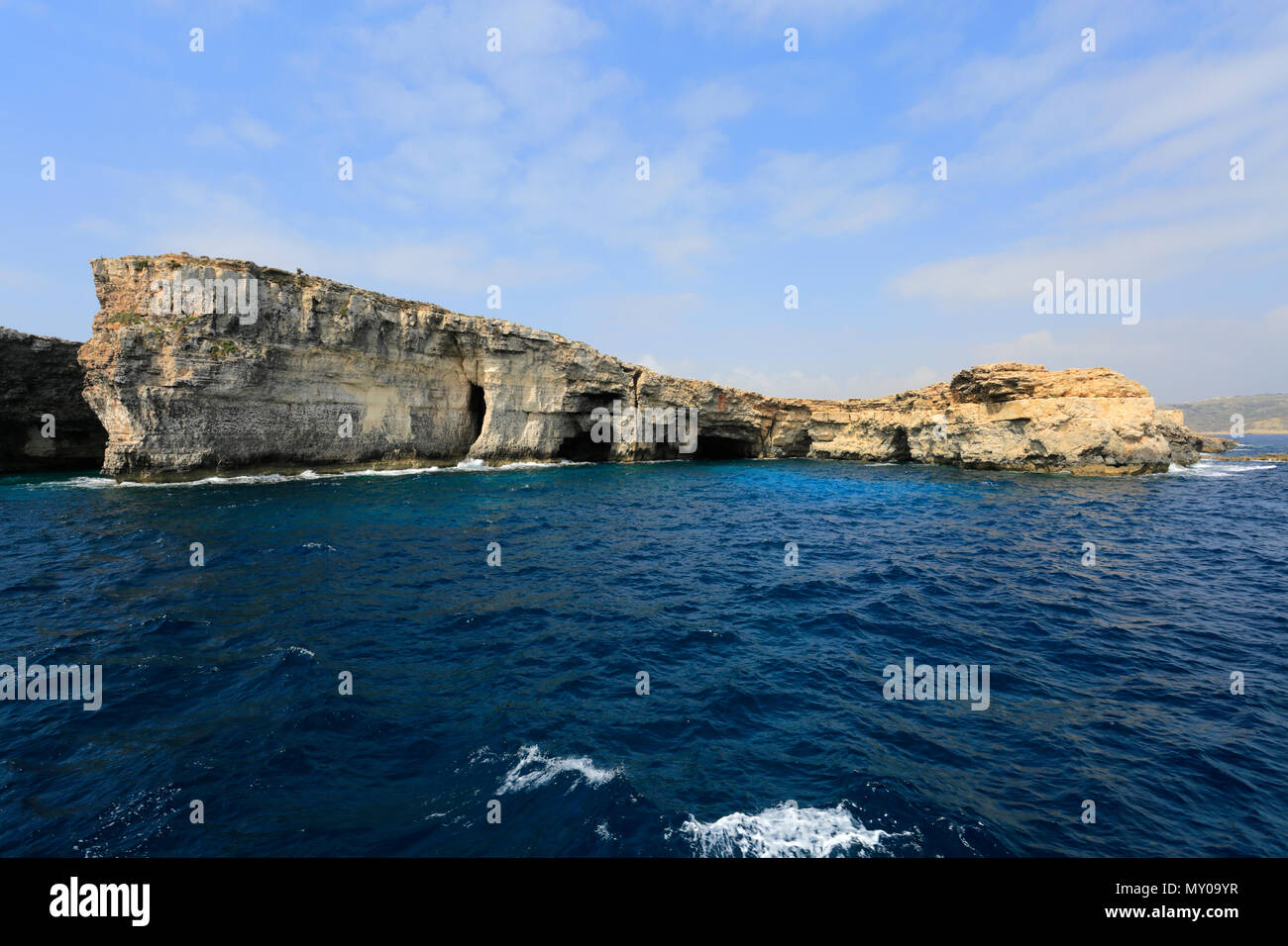 Caves on the coast of Comino Island, Malta Stock Photo - Alamy