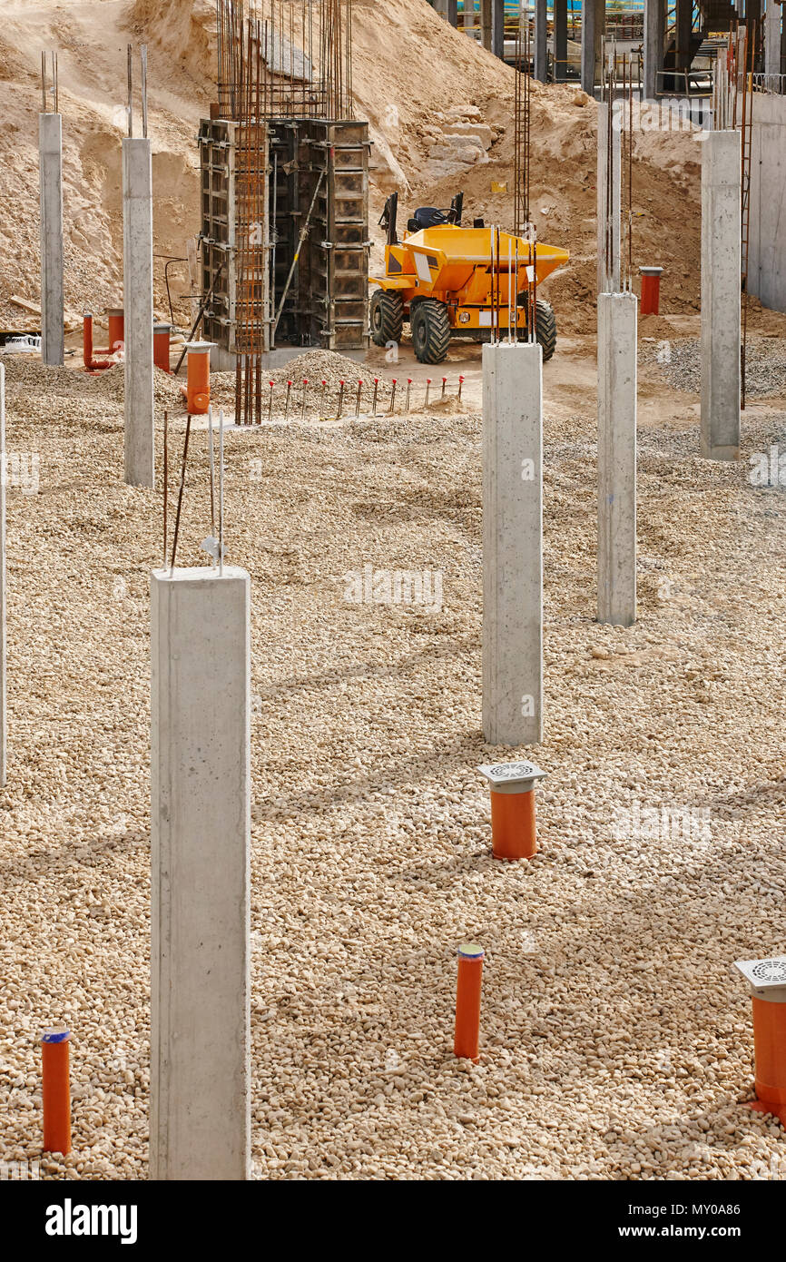 Building under construction. Concrete columns platform. Industry ...