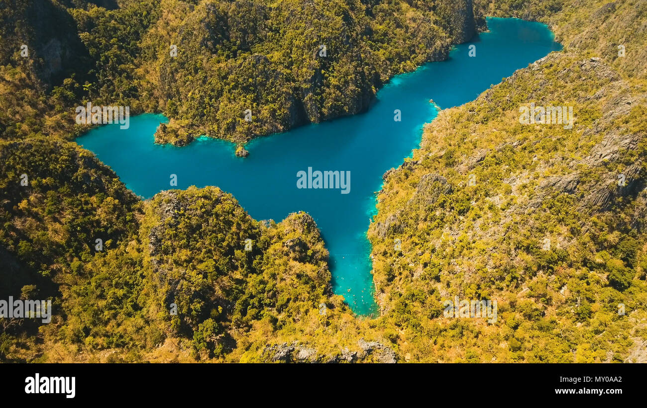 Aerial view:Mountain Kayangan lake,on a tropical island with blue water ...