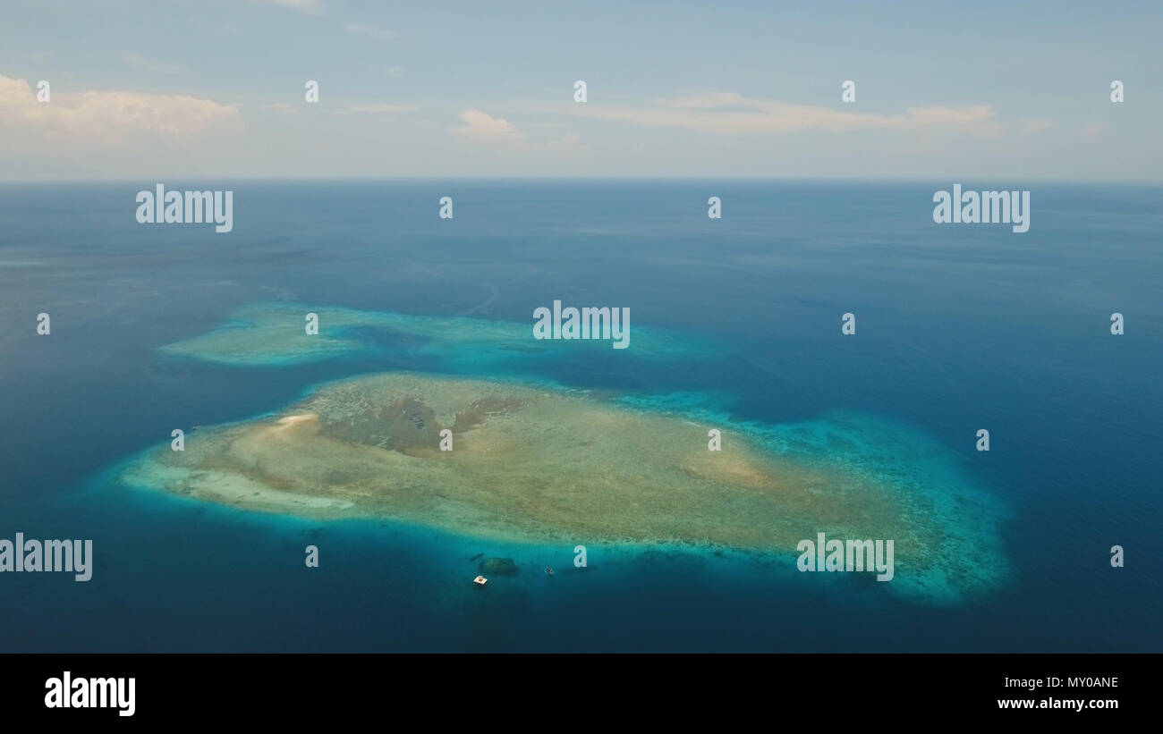 Aerial view coral reef, atoll with turquoise water in the sea.Tropical ...