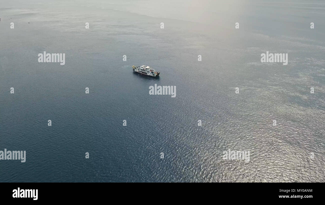 Aerial view passenger ferryboat in the blue sea, Gilimanuk, Bali ...